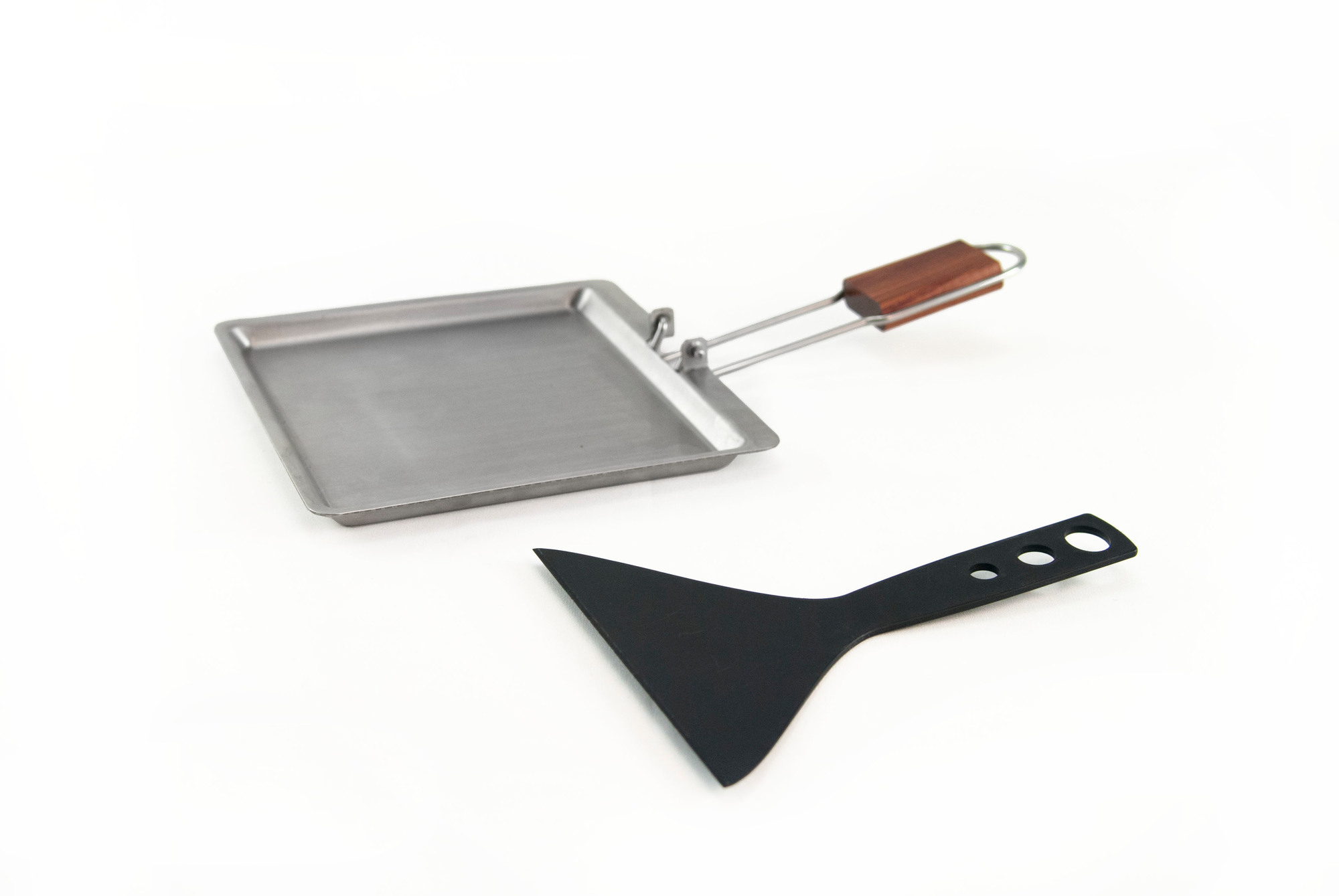 Ruostumaton raclette-pannu, jossa on kaavin - Gigantti verkkokauppa